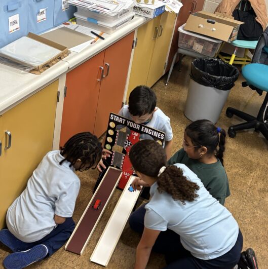 Emerson Elementary School - Exploring Motion with Toy Cars and Ramps!